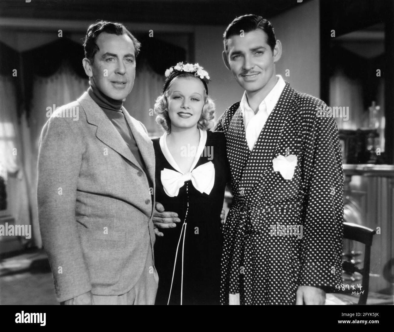 Director JACK CONWAY JEAN HARLOW and CLARK GABLE on set candid portrait during filming of Harlow ...