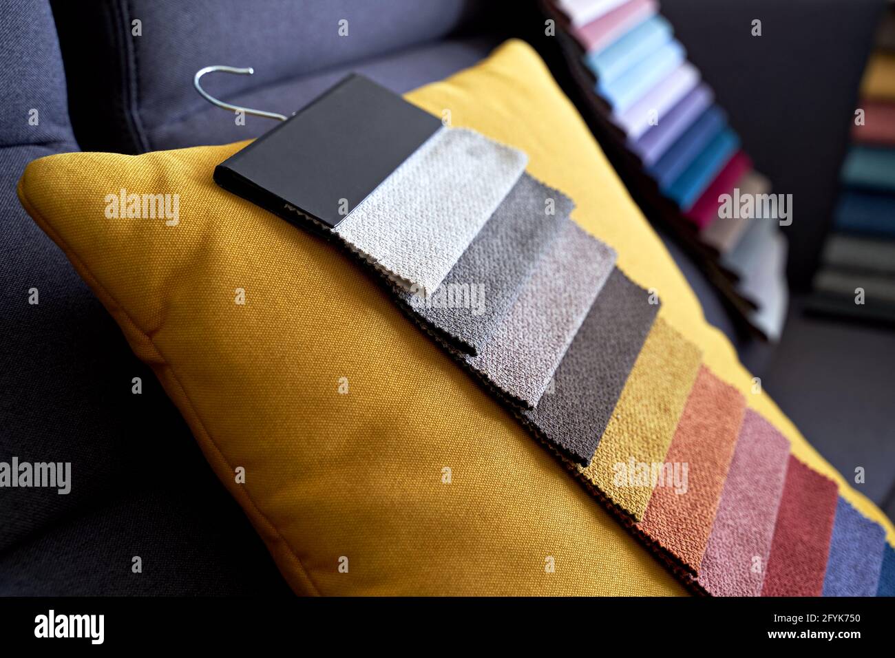 Colorful upholstery fabric samples on the sofa Stock Photo - Alamy