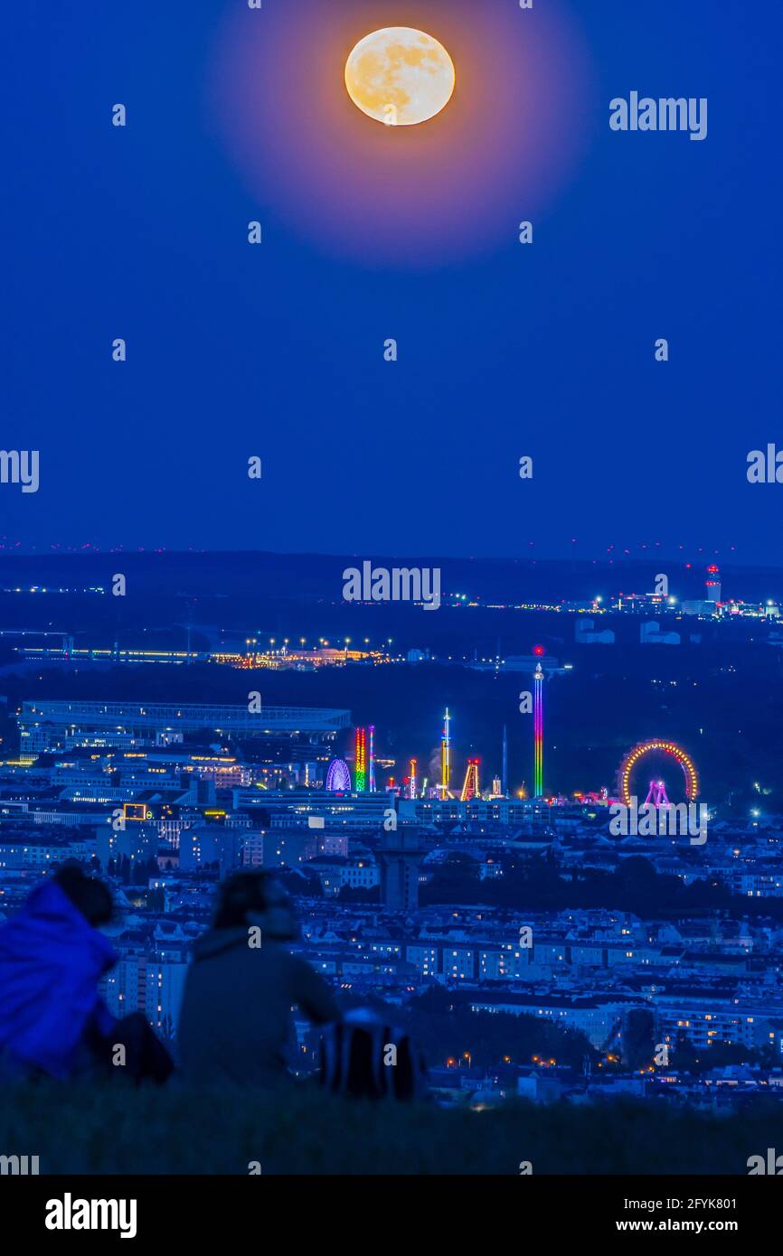 Wien, Vienna: rising super full moon above Vienna, Prater and Ferris ...