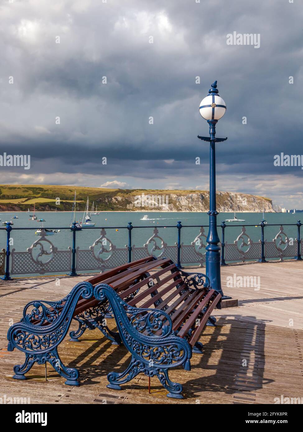 View from the Victorian Swanage pier across the bay with the coastal ...