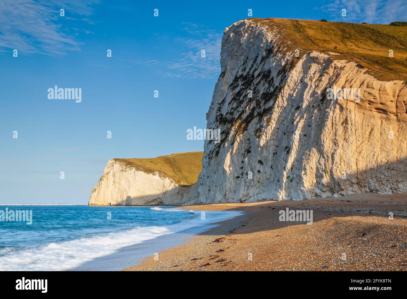 View west from Durdle Door to the chalk headland of Bat's Head on the ...