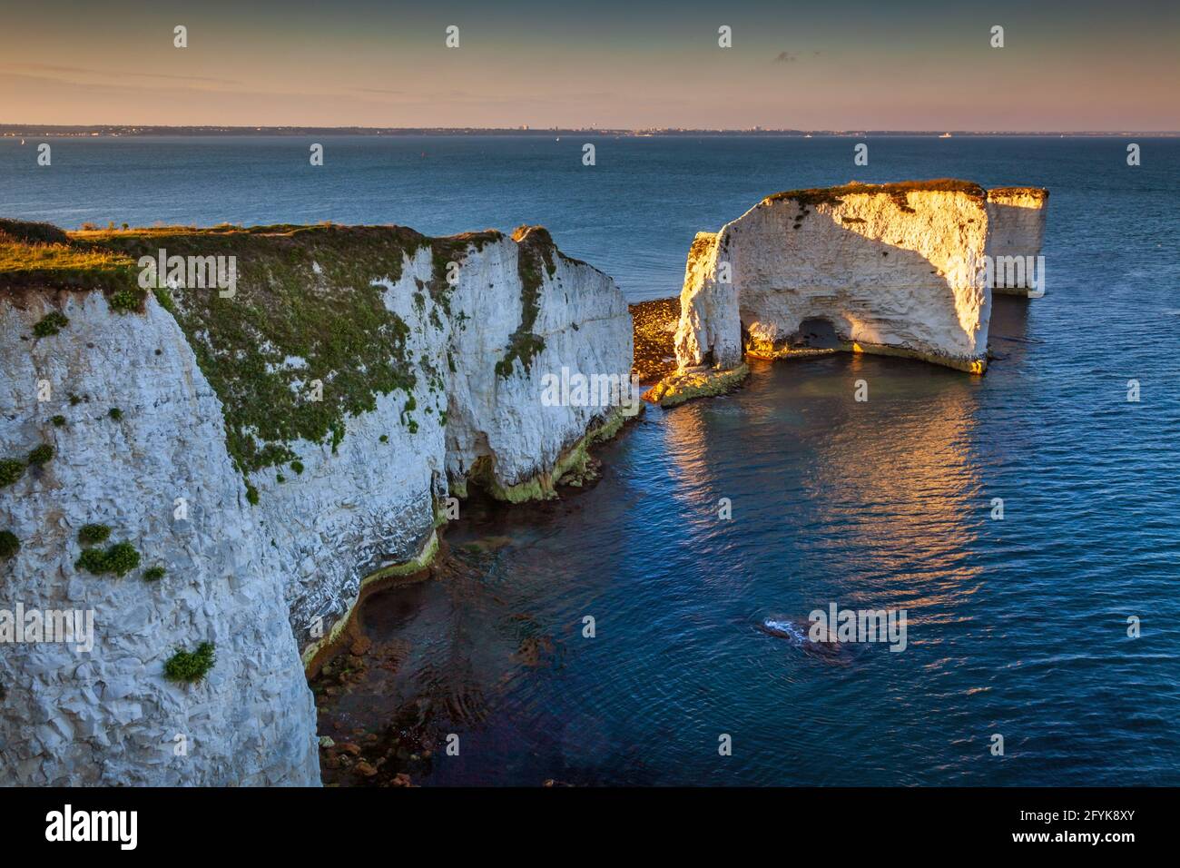 The white chalk formations known as Old Harry Rocks are one of the ...