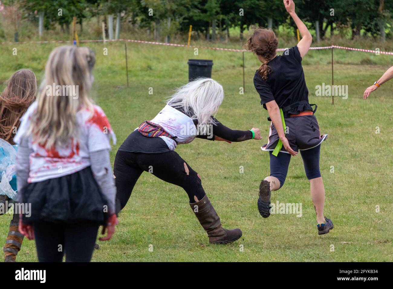 Runner at a Zombie Evacuation avoiding the anticipated zombies Stock ...