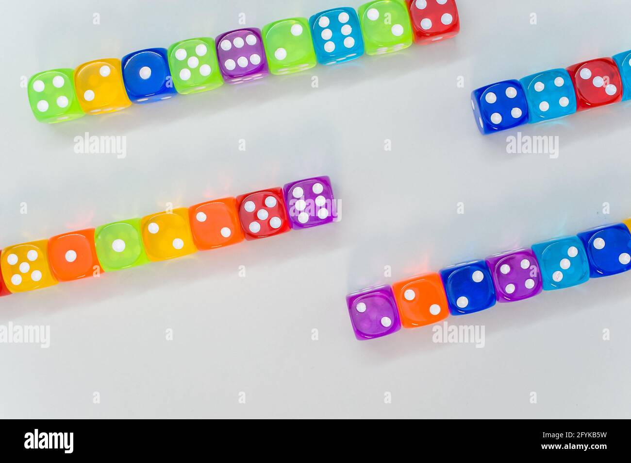 Top view of colorful transparent dice on white background Stock Photo ...