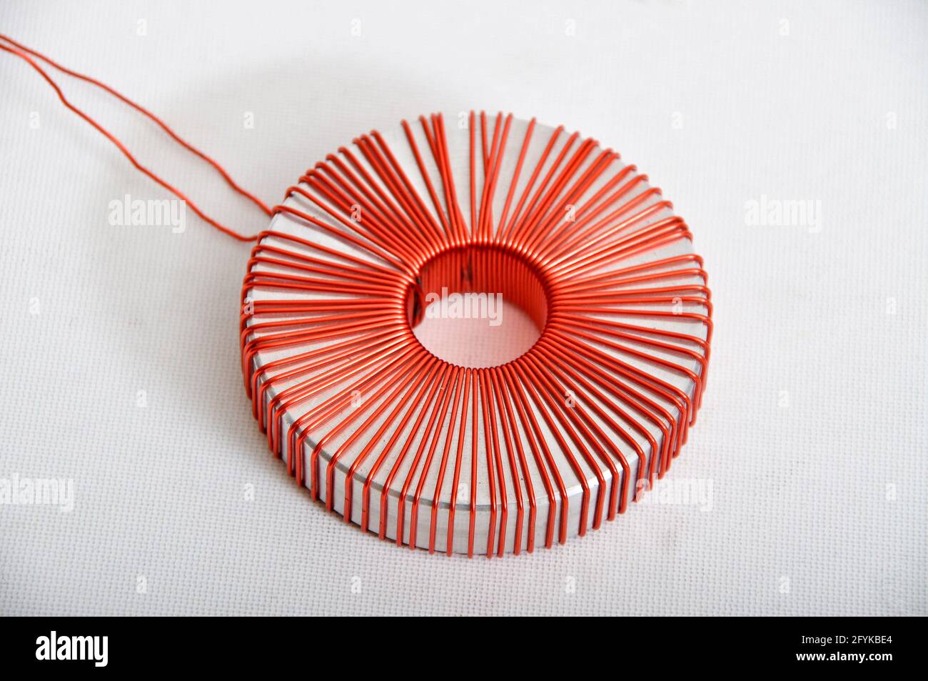 Transformer copper wire coil isolated on a white background Stock Photo ...