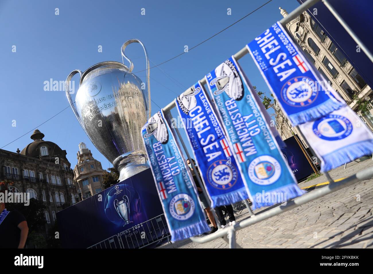 English fans of Chelsea and Manchester City drink beer in the host city ...