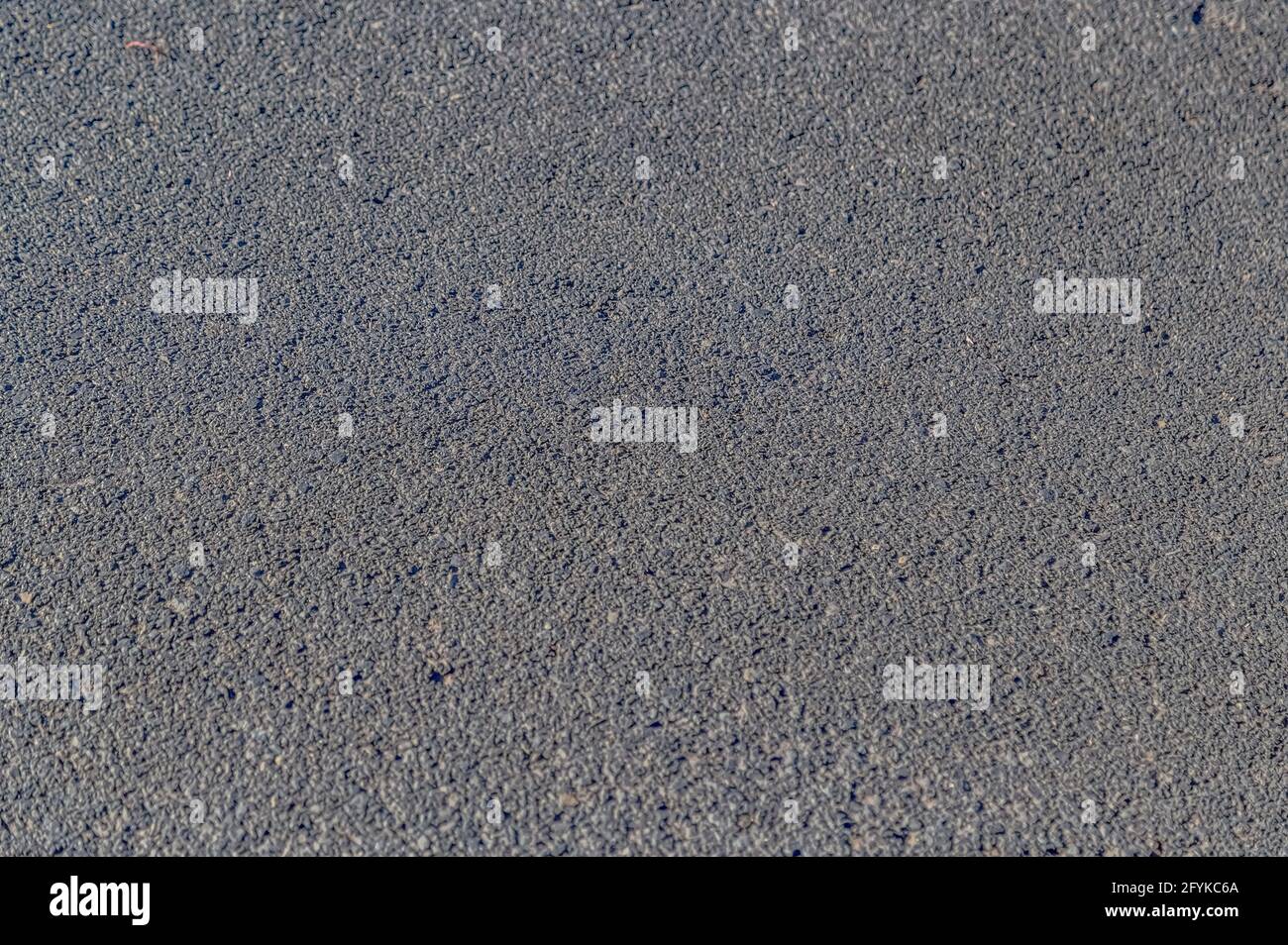 Close up of an asphalt paved driveway Stock Photo - Alamy