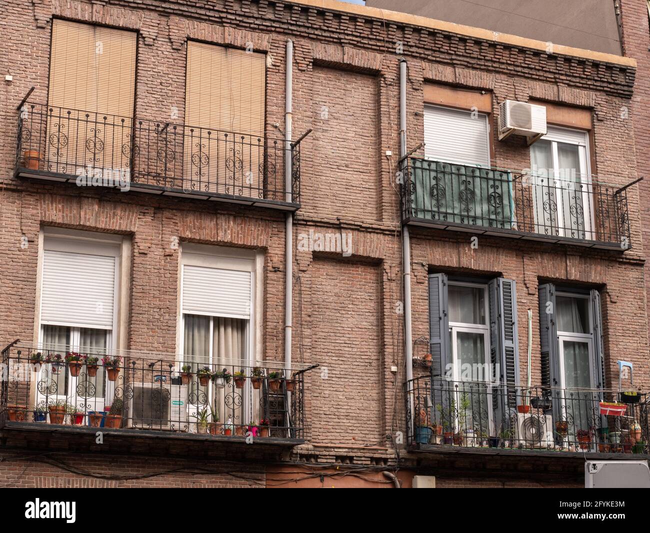 POOR NEIGHBORHOOD STREET WITH CLOTHES AND GARBAGE Stock Photo - Alamy