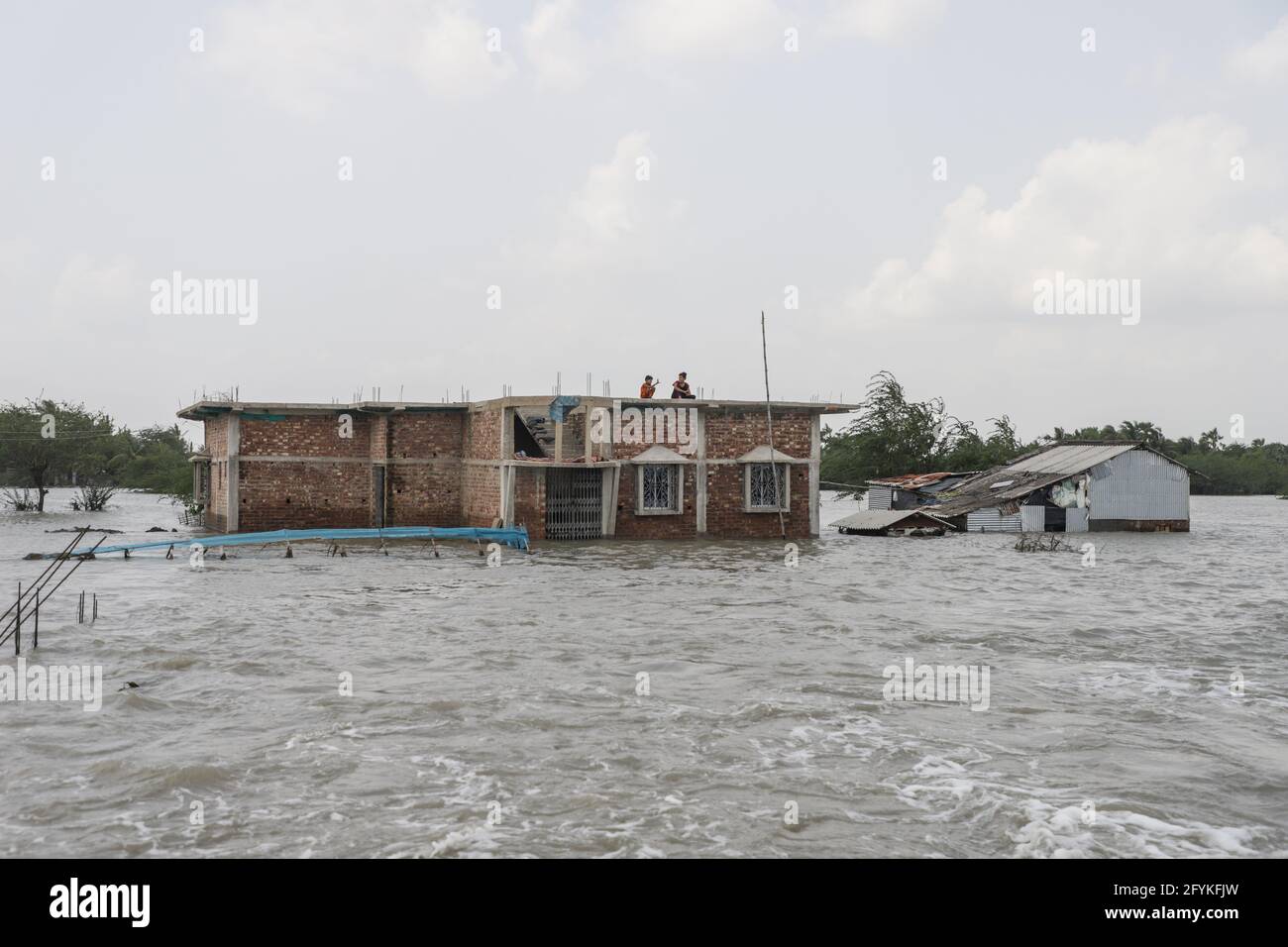 Submerged houses of a flood-hit coastal village during the aftermath ...