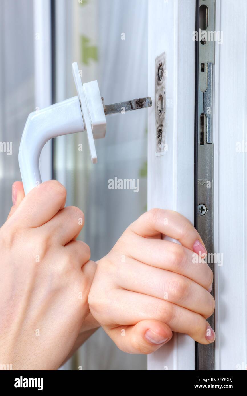 Mounting handle on double hung window with double-glazed Stock Photo ...