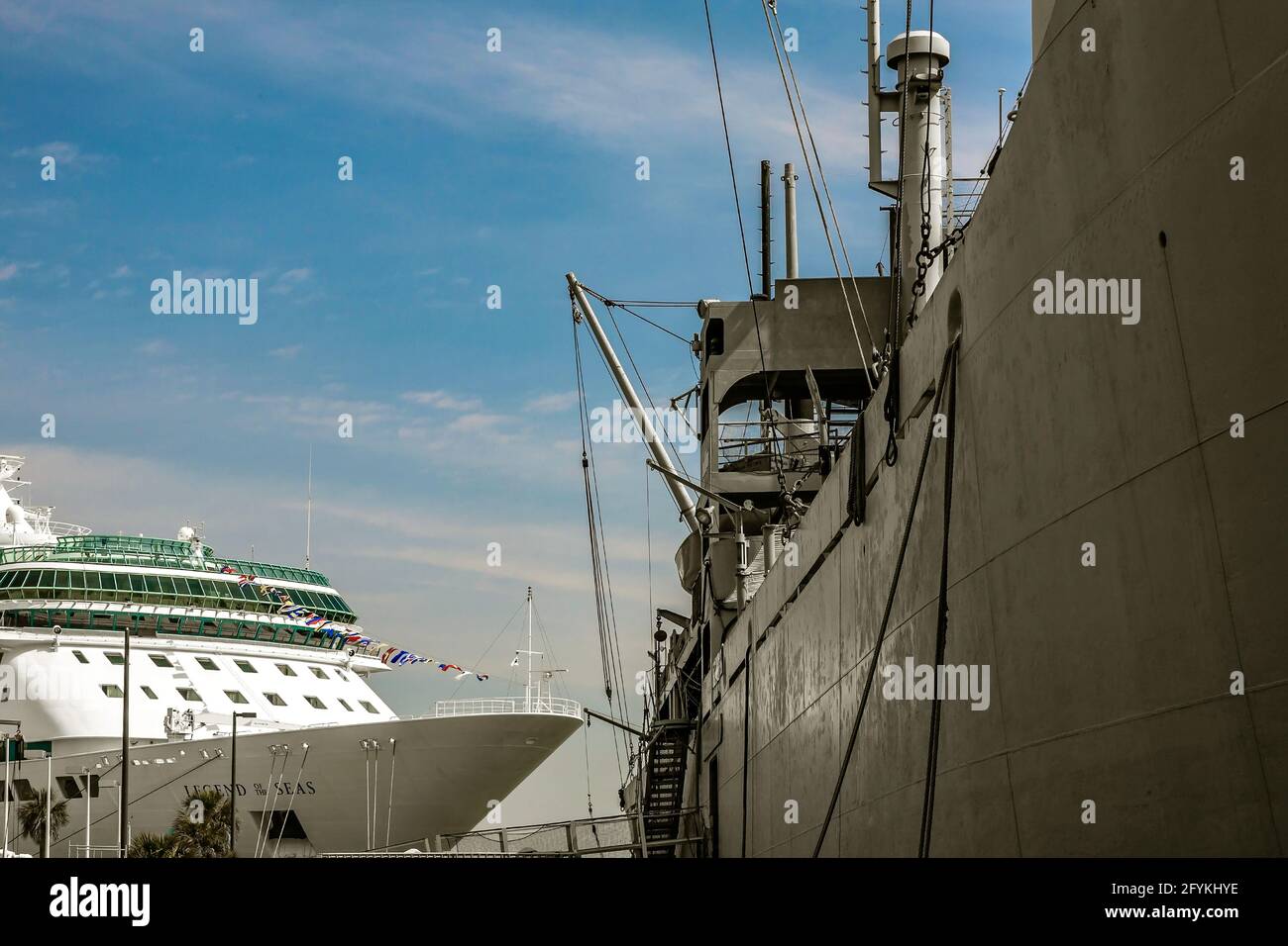 Cruise ship Legend of the Seas moored aft of the WWII Victory ship ...