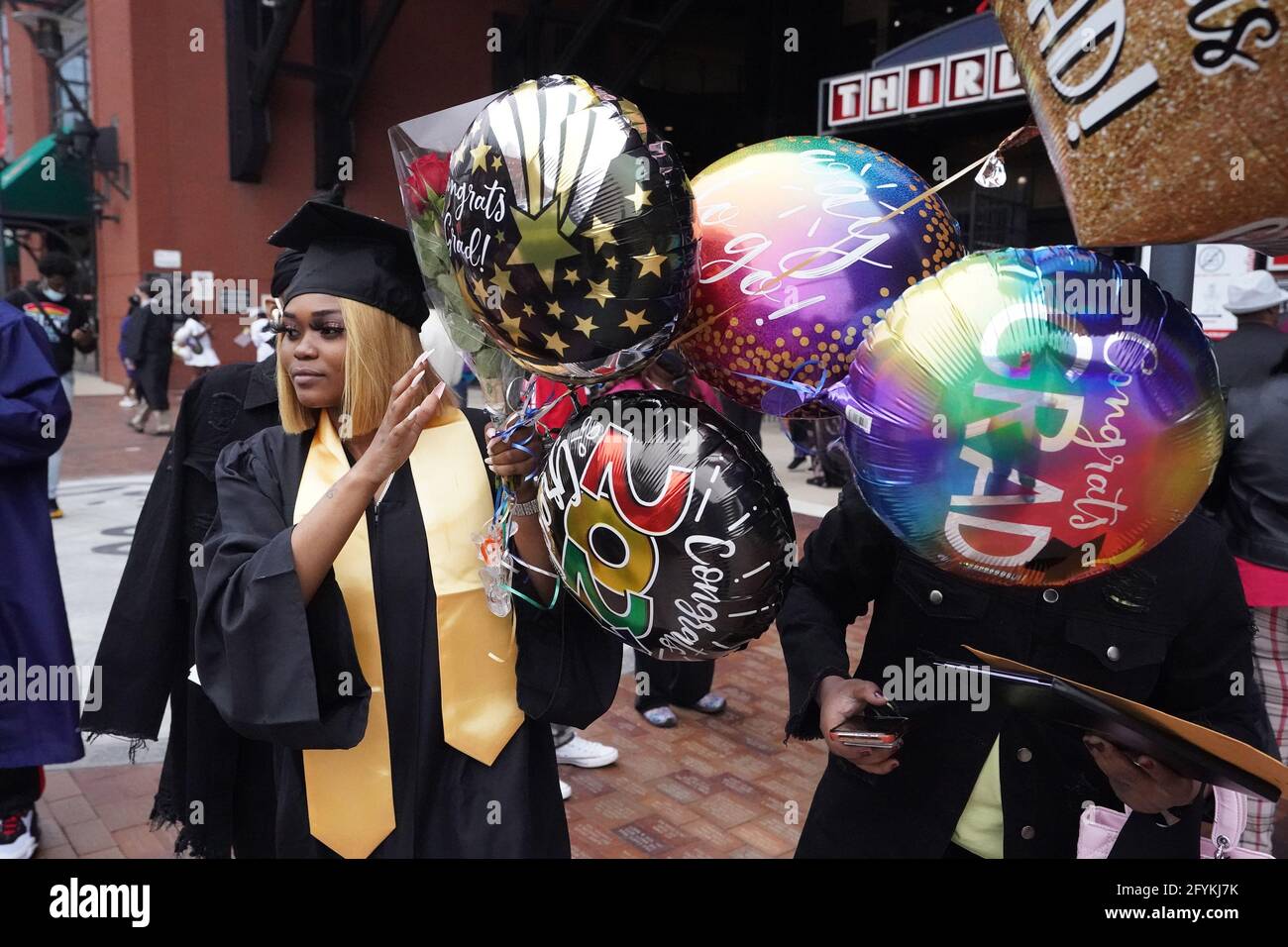 St. Louis, United States. 28th May, 2021. A graduating senior leaves ...