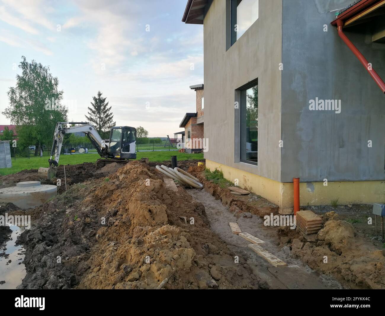 Drainage ditch close to individual house under construction in ...