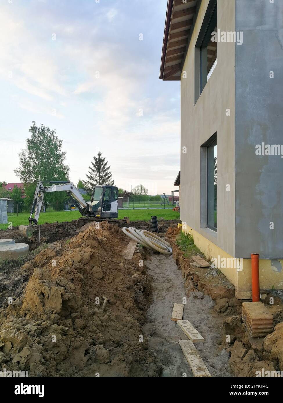 Drainage ditch close to individual house under construction in ...