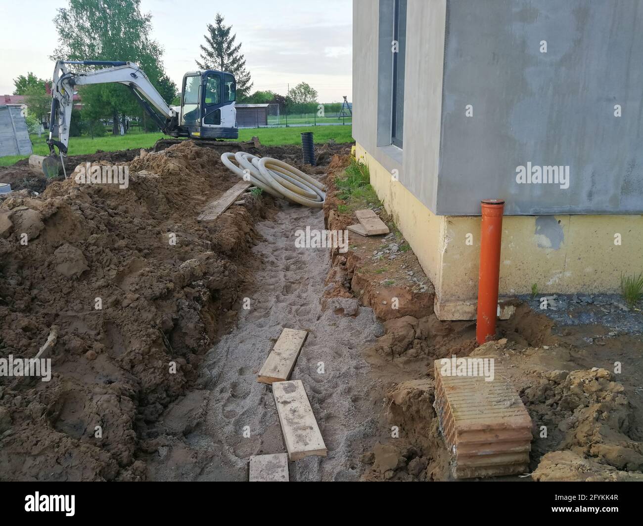 Drainage ditch close to individual house under construction in ...