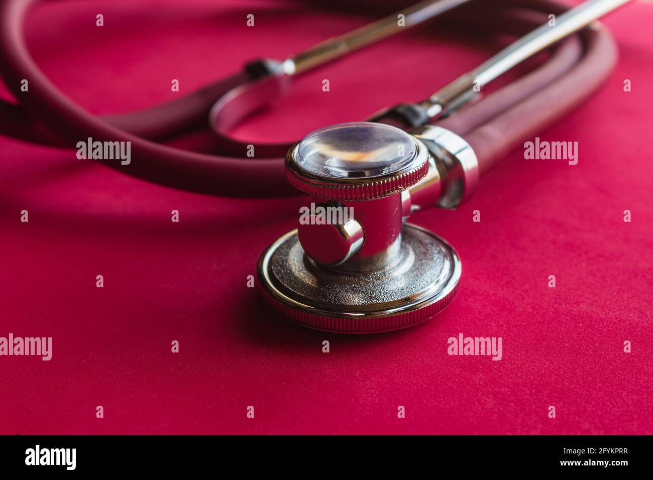 Red stethoscope, equipment to examine respiration and heartbeat Stock ...