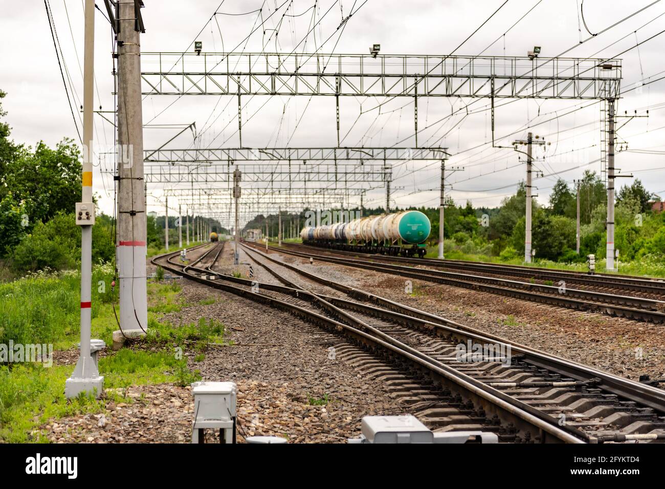 Tank cars on railway tracks. Focus in the foreground. Individual tank ...