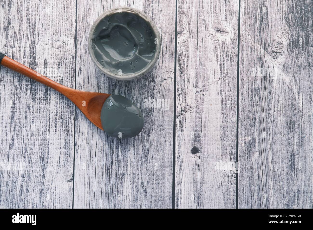 bubble clay mask in container on white background Stock Photo - Alamy