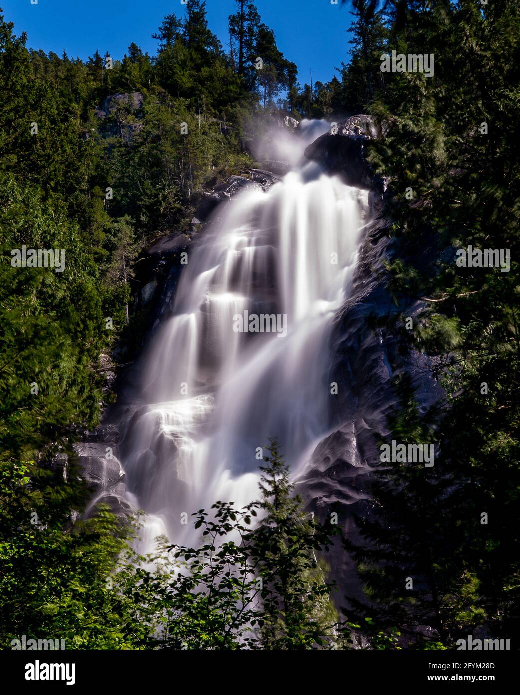 The water from Shannon Creek tumbles down Shannon Falls near Squamish ...