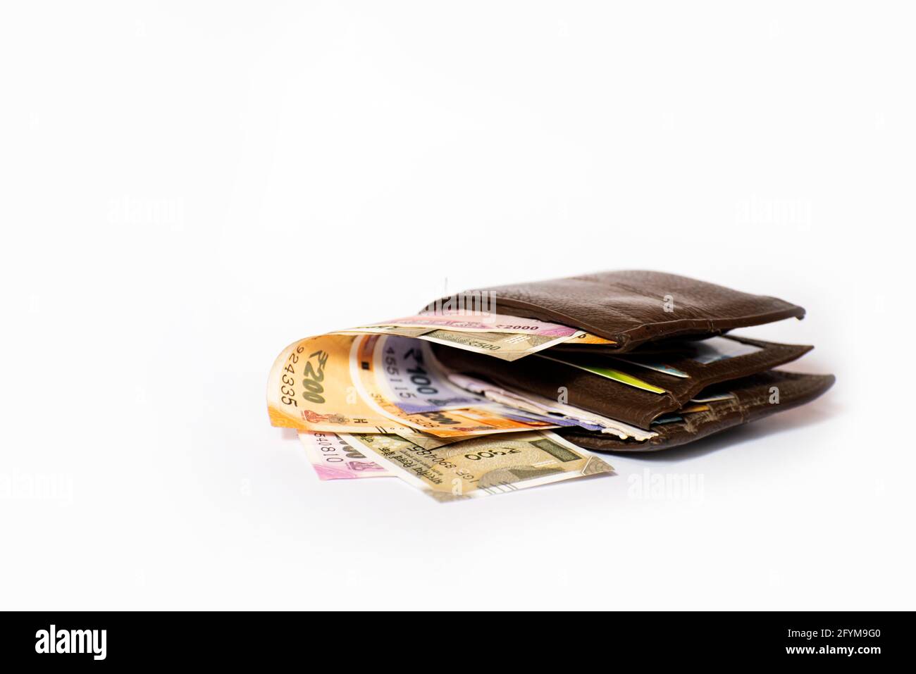 Close up view of wallet with Indian currency banknotes isolated on ...