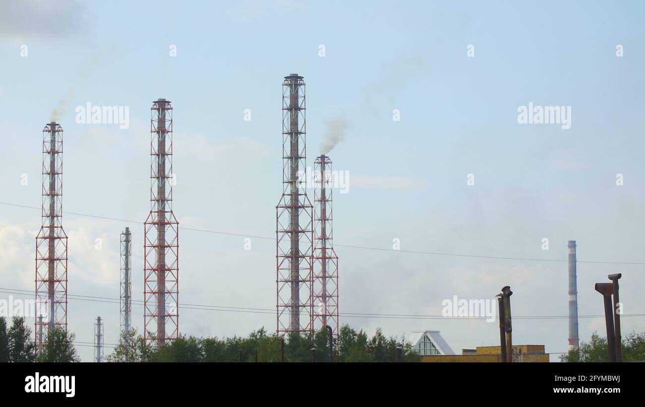 Photo of industrial chemical factory with white smoke from pipes Stock ...