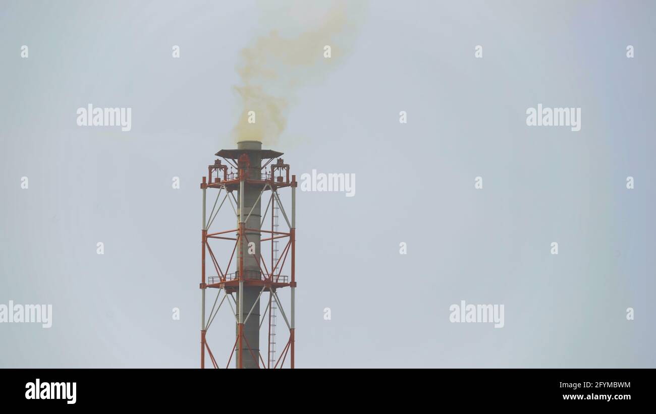 Industrial chemical factory with white smoke from pipes Stock Photo - Alamy