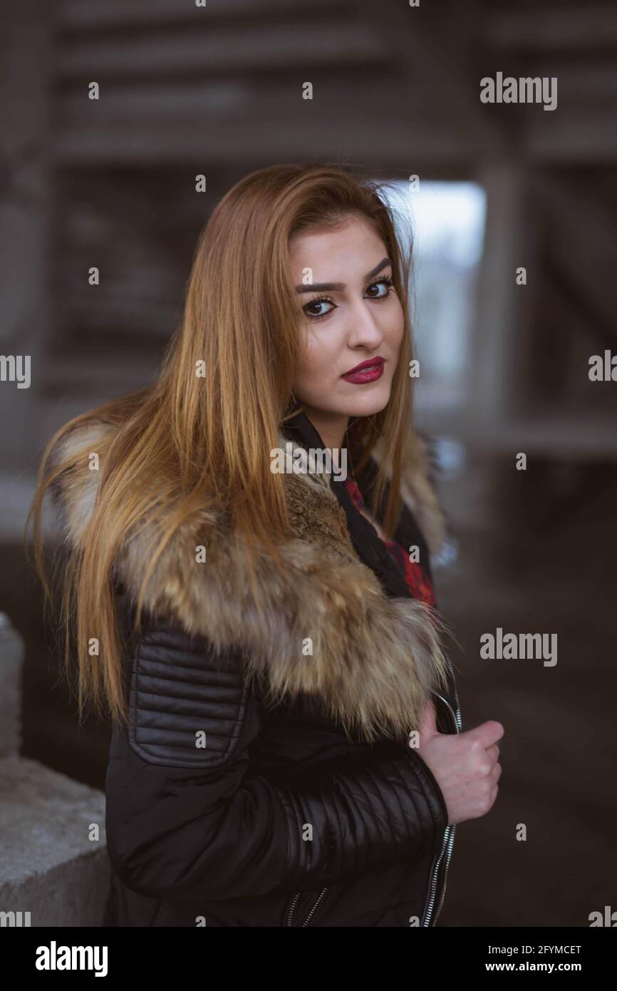 Vertical closeup shot of a young attractive ginger female posing Stock ...