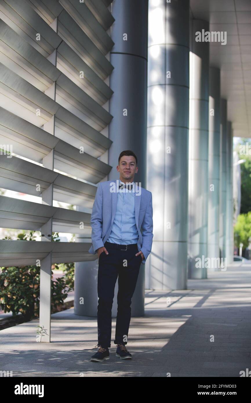 A young caucasian businessman posing outdoors Stock Photo - Alamy