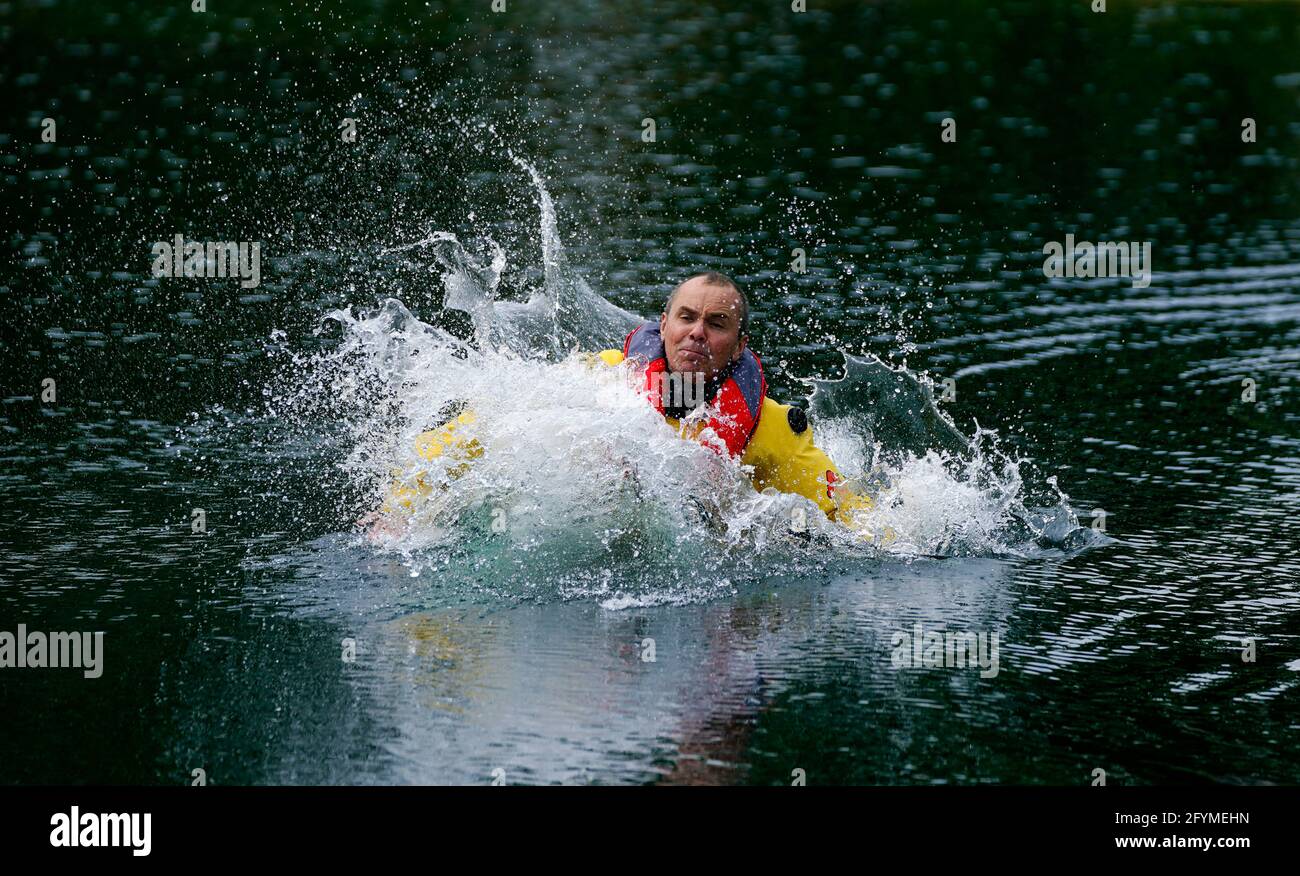 A pilot receives training in how to deal with ditching their aircraft ...