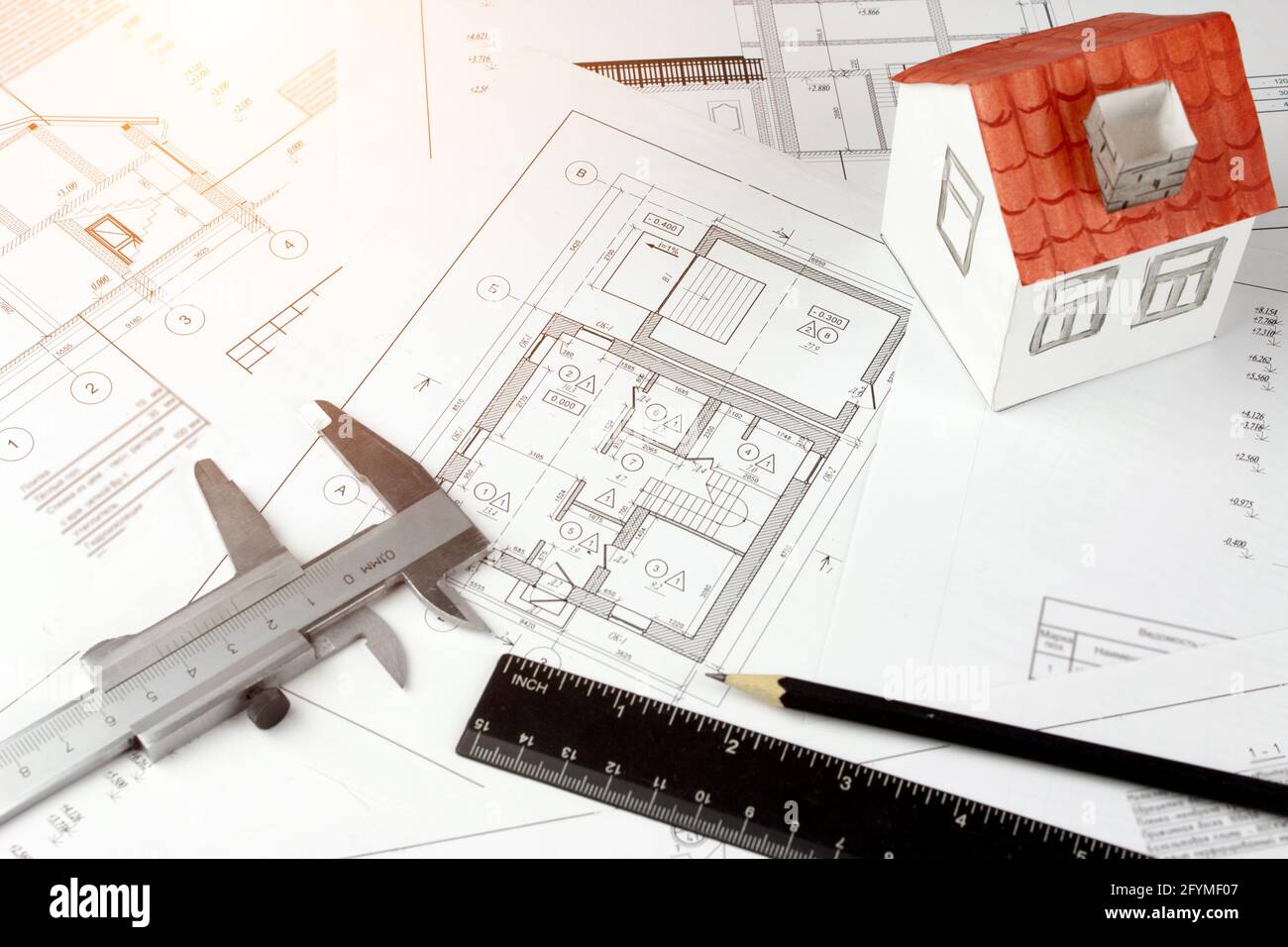 Paper architectural drawings and blueprint, interior design plans and ...