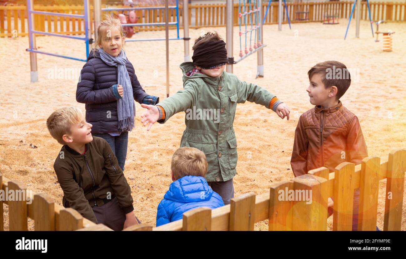 Children play in the blind man's buff Stock Photo - Alamy