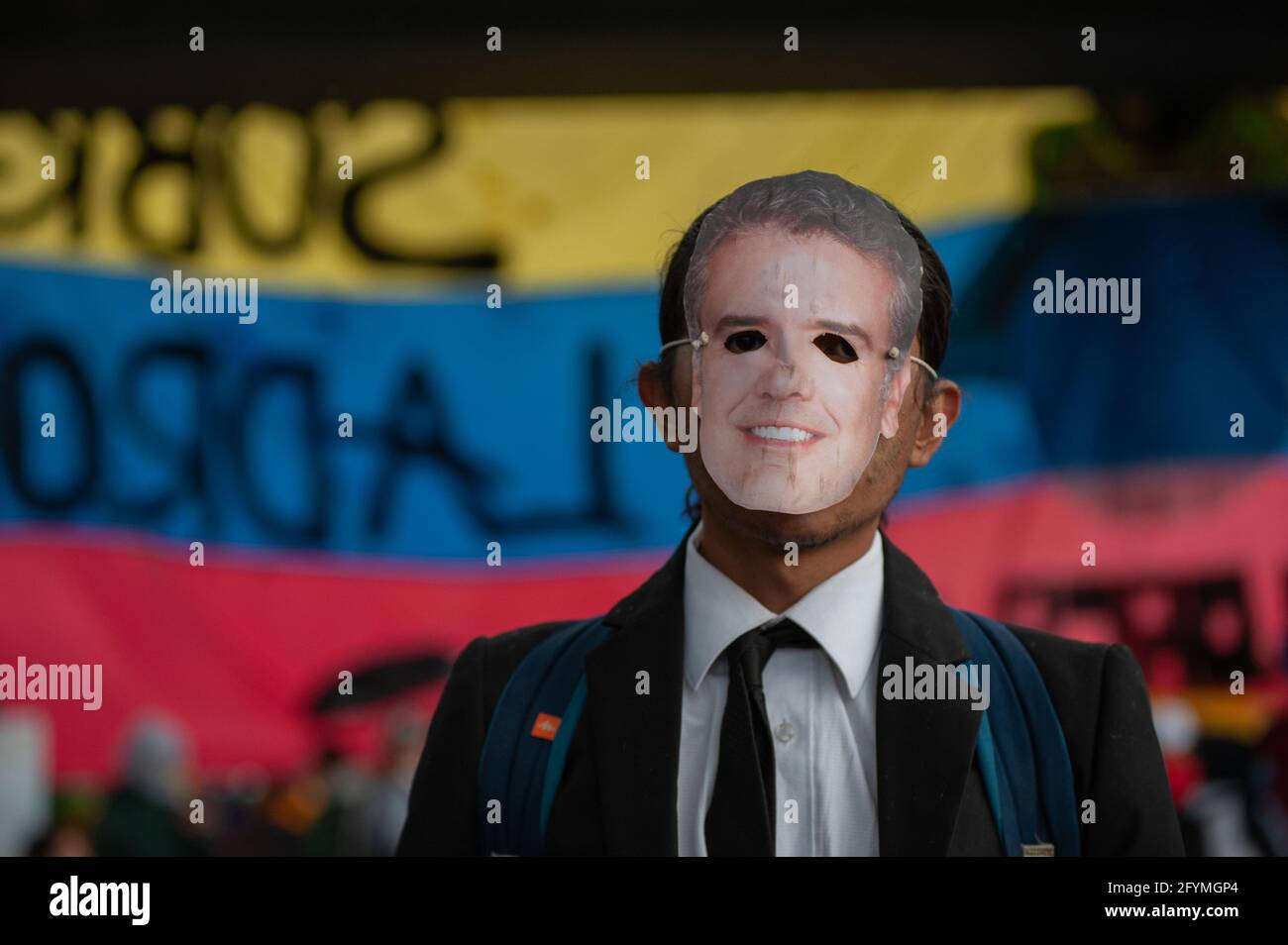 Bogota, Colombia. 28th May, 2021. A demonstrator wearing a mask with a ...