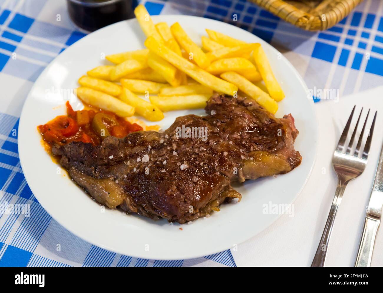 Beef entrecote with pickled vegetables served at plate, spanish cuisine ...