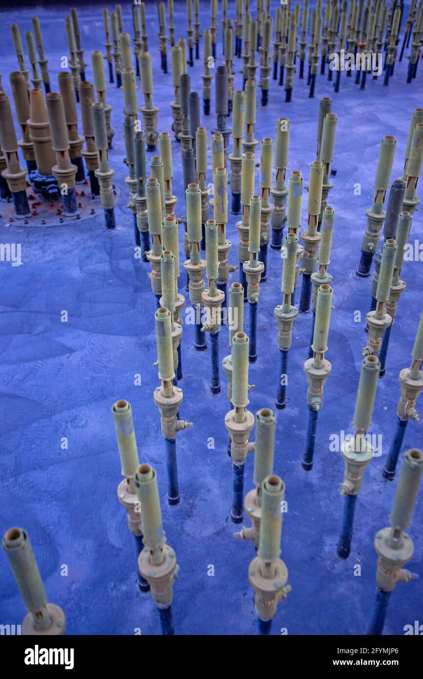 Water pipes in a fountain pool Stock Photo - Alamy