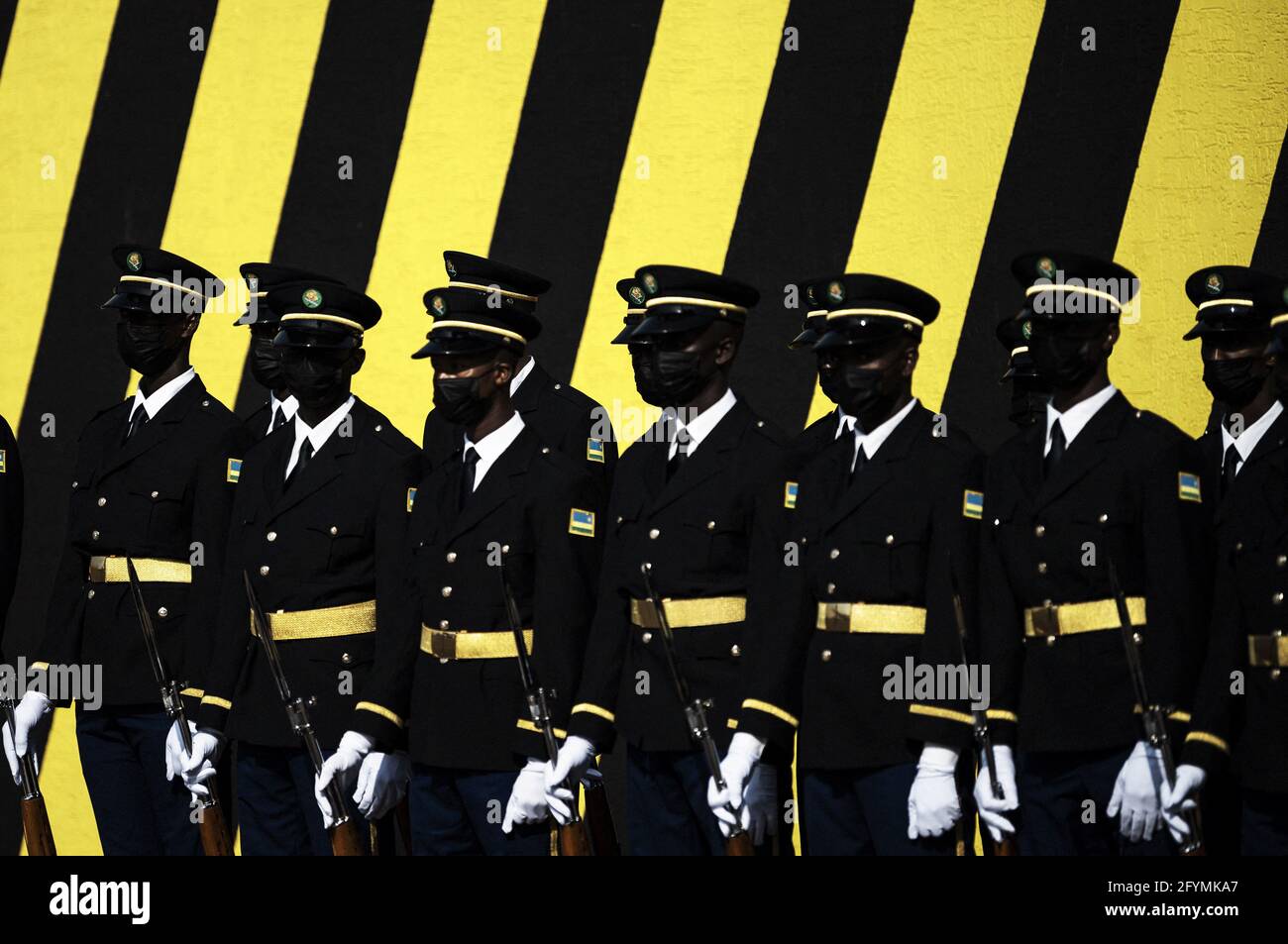 Rwanda's troops form a honor guard as French President leaves Rwanda ...