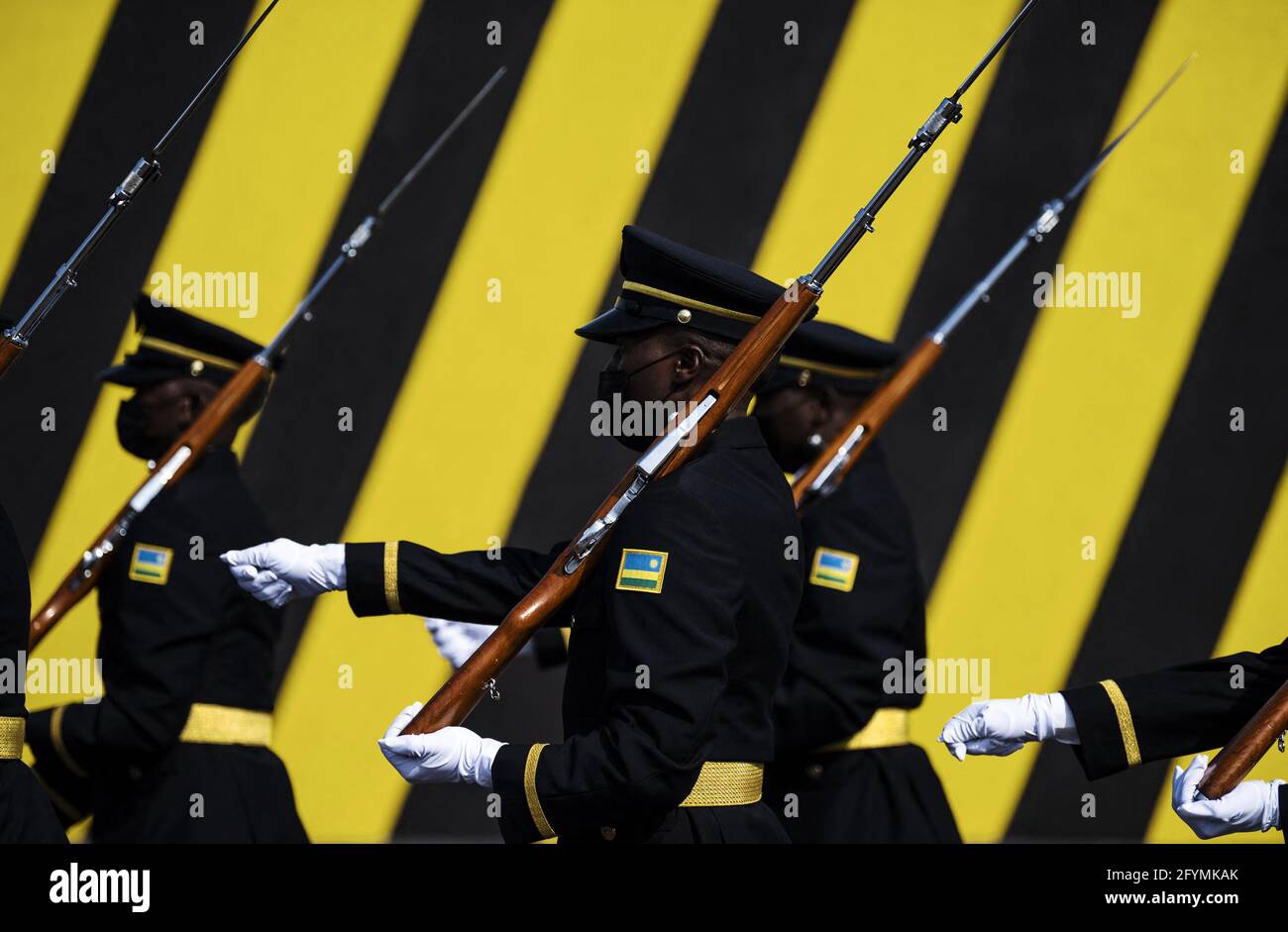 Rwanda's troops form a honor guard as French President leaves Rwanda ...