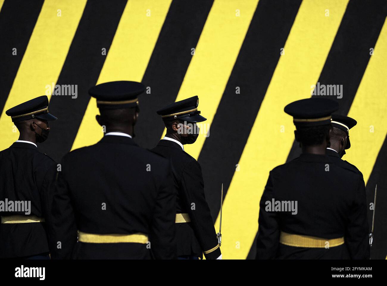 Rwanda's troops form a honor guard as French President leaves Rwanda ...
