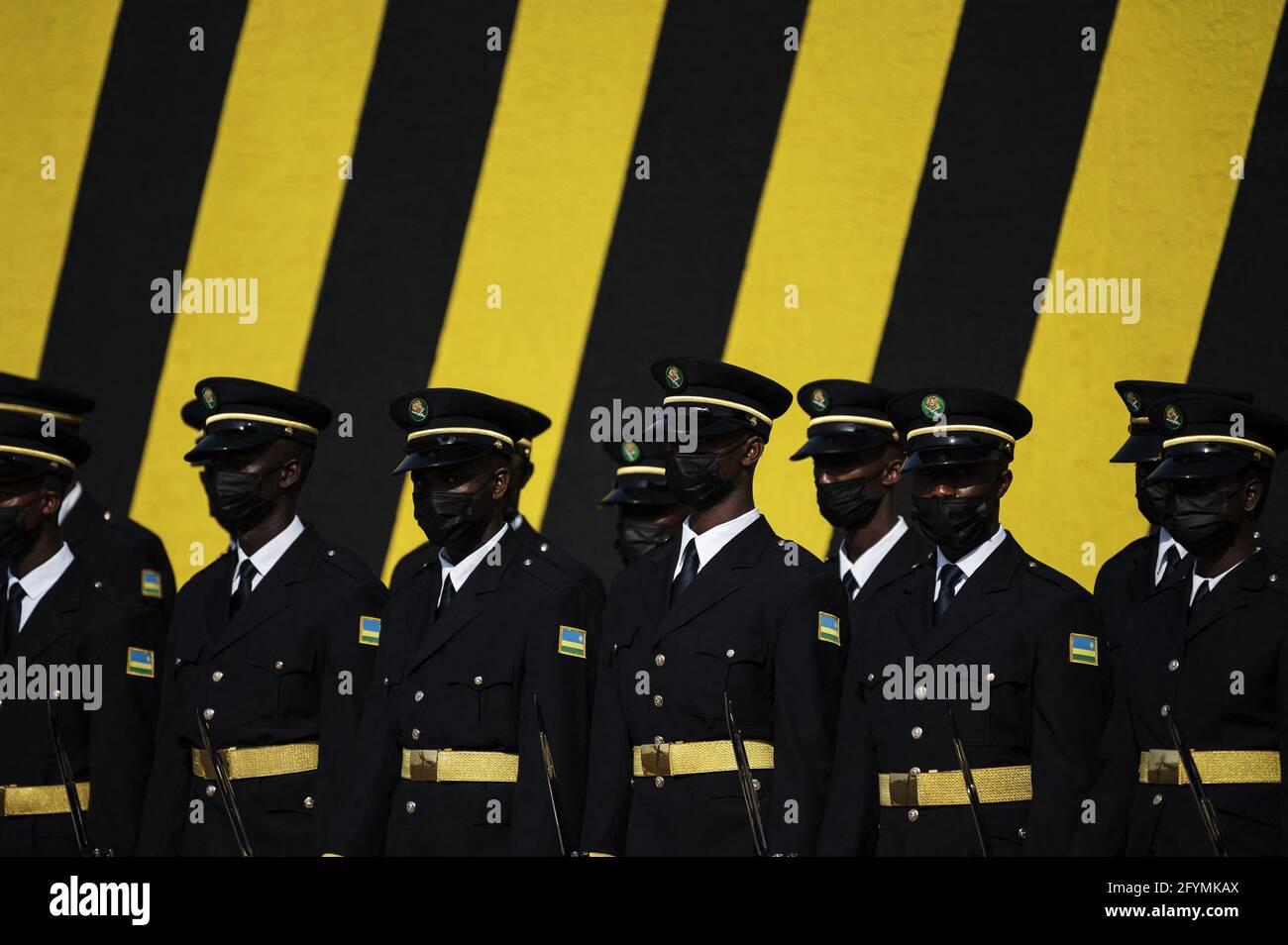 Rwanda's troops form a honor guard as French President leaves Rwanda ...