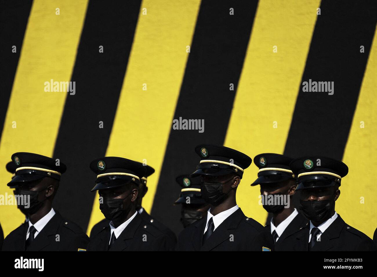 Rwanda's troops form a honor guard as French President leaves Rwanda ...