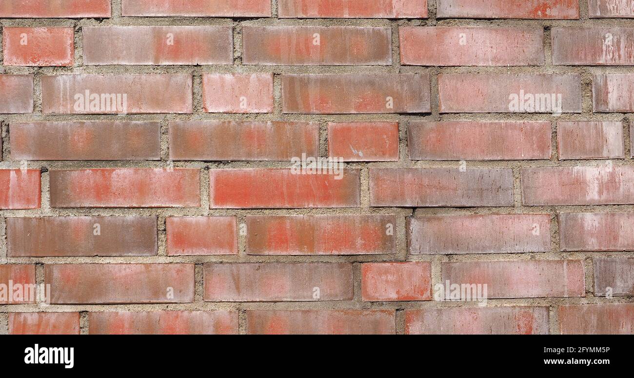 wide 4K red brick wall useful as a background Stock Photo - Alamy