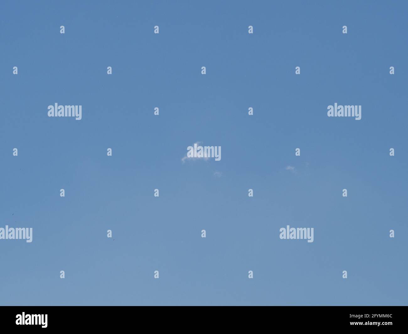 blue sky with lonely clouds useful as a background Stock Photo - Alamy