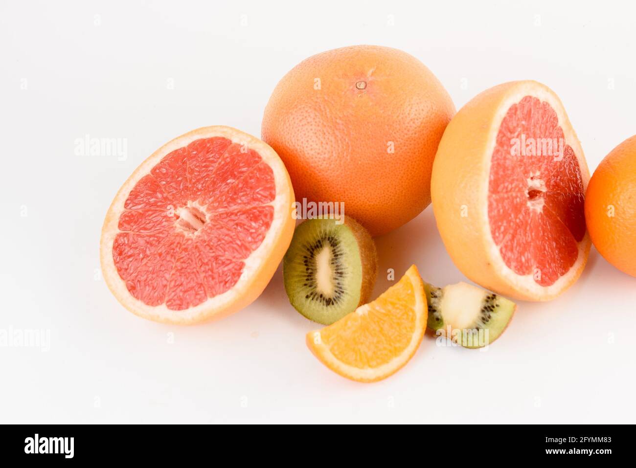 Mix of orange, kiwi, grapefruit on white background. Citrus fruit ...