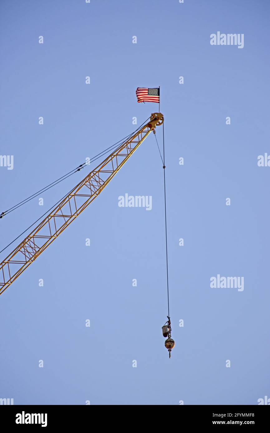 Flag on construction crane hi-res stock photography and images - Alamy