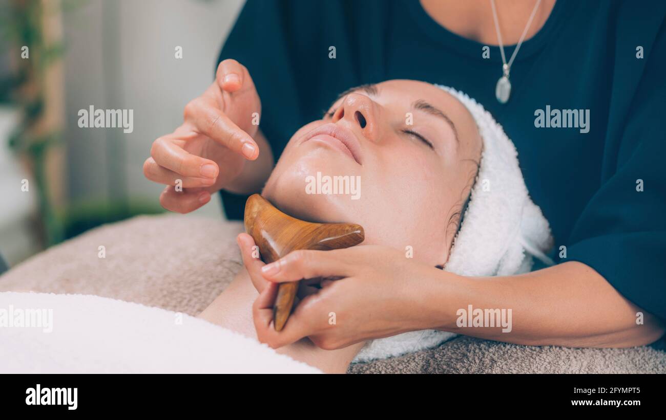 Hand lifting chin up hi-res stock photography and images - Alamy