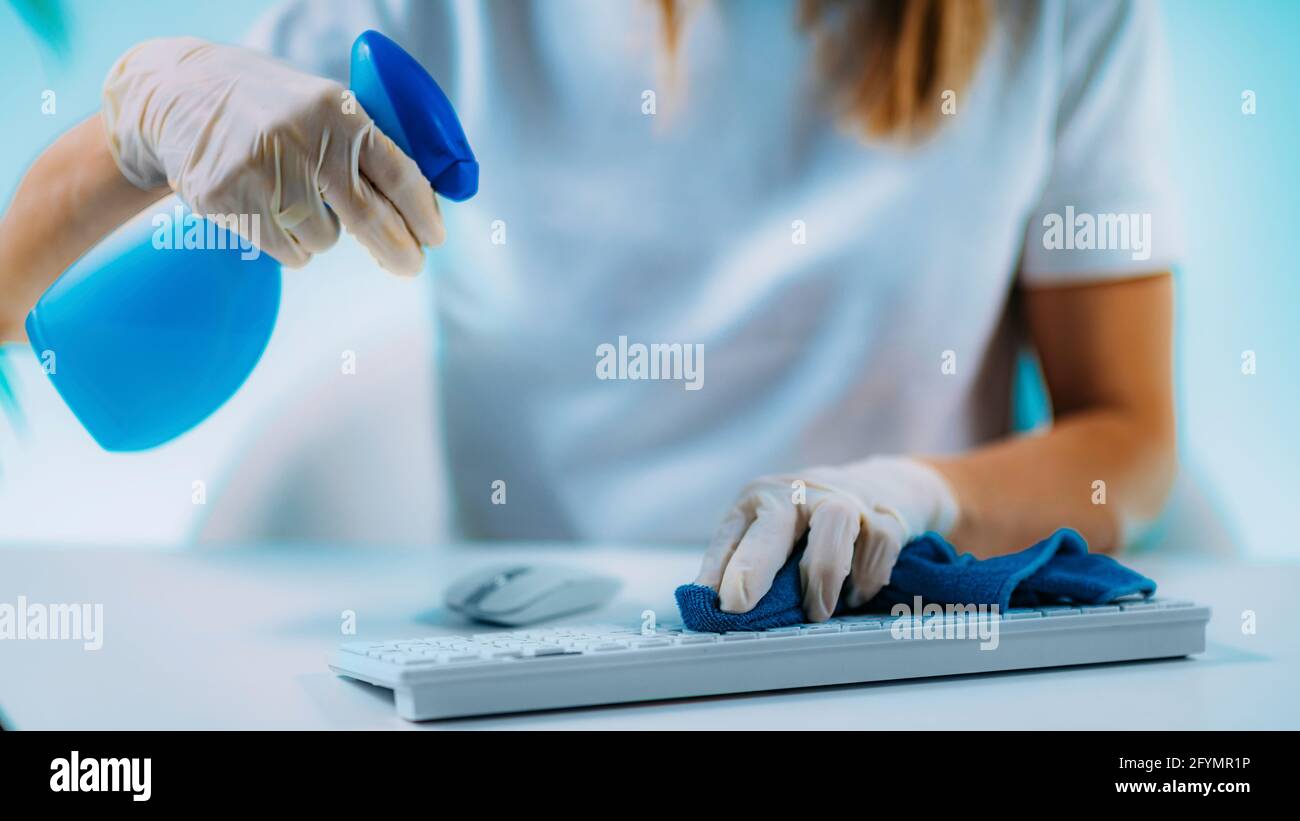 Disinfection of computer keyboard and mouse with alcohol Stock Photo ...