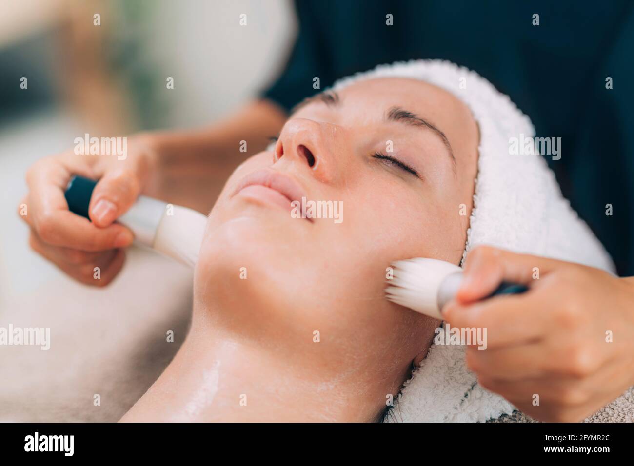 Face cleansing before cosmetic treatment Stock Photo - Alamy