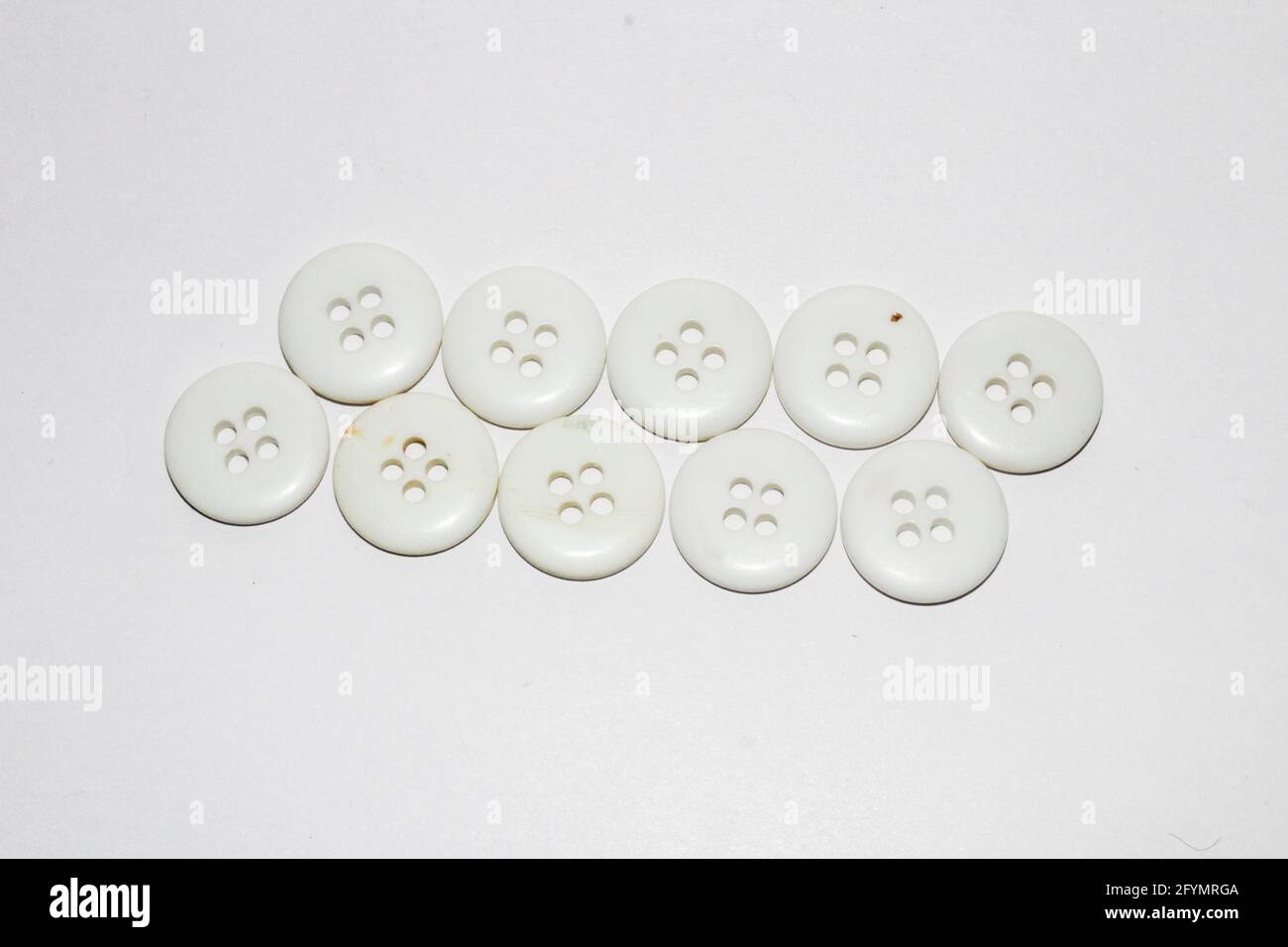 Closeup shot of white buttons isolated on a white background Stock ...