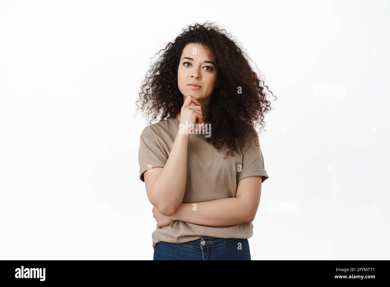 Portrait of complicated woman making decision, thinking and looking ...