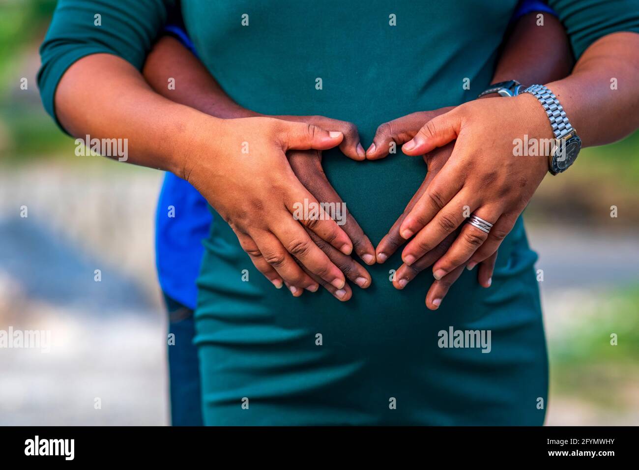 Pregnancy bump african woman hi-res stock photography and images - Alamy
