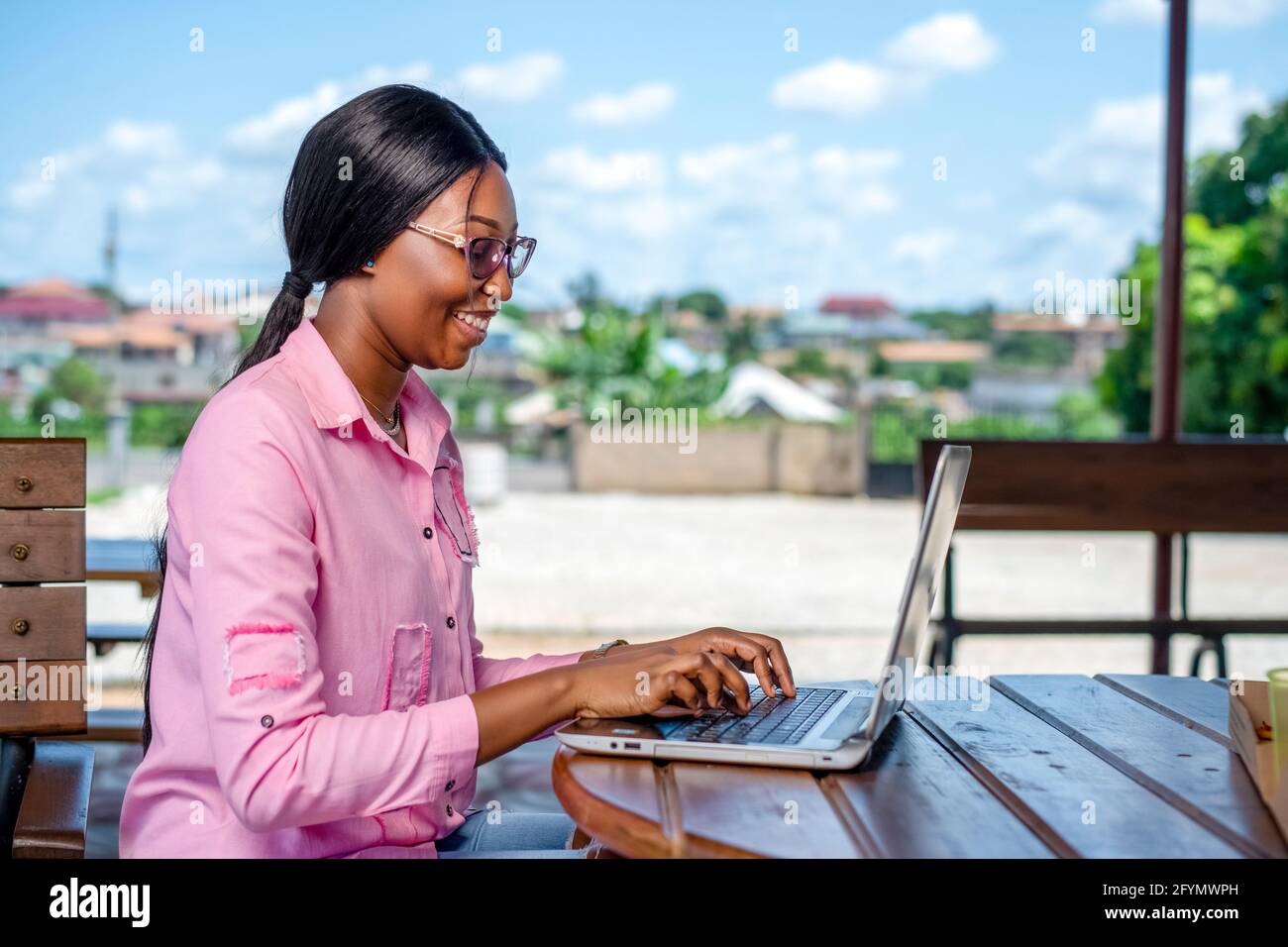 Female with laptop hi-res stock photography and images - Alamy